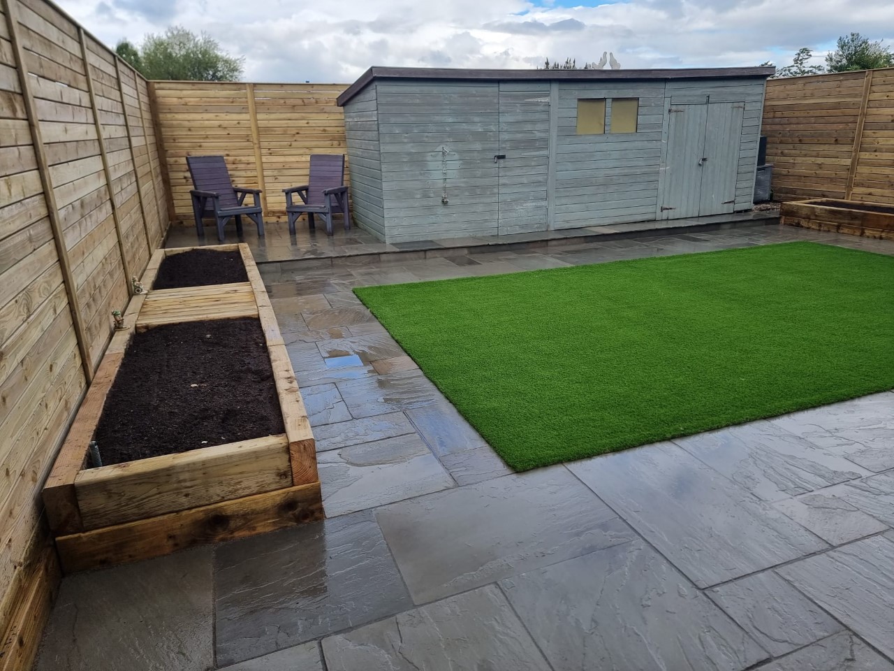 A Modern Indian Stone Patio with Premium Artificial Grass - Wigan - JPM ...